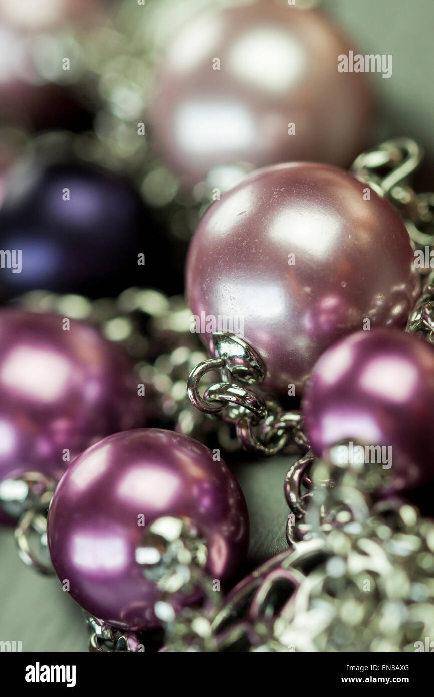Gold beads attached hi-res stock photography and images - Alamy