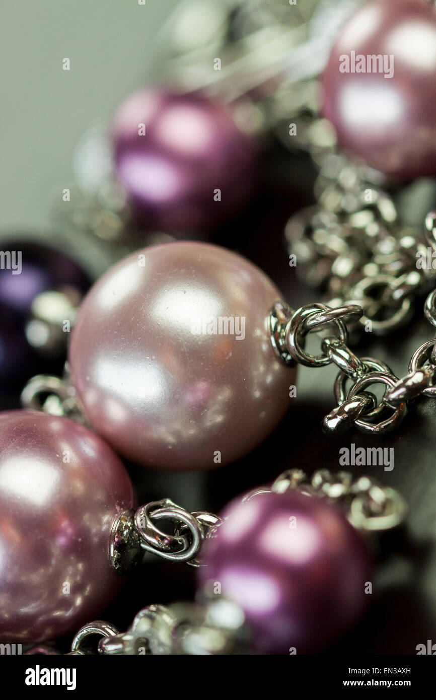 Gold beads attached hi-res stock photography and images - Alamy