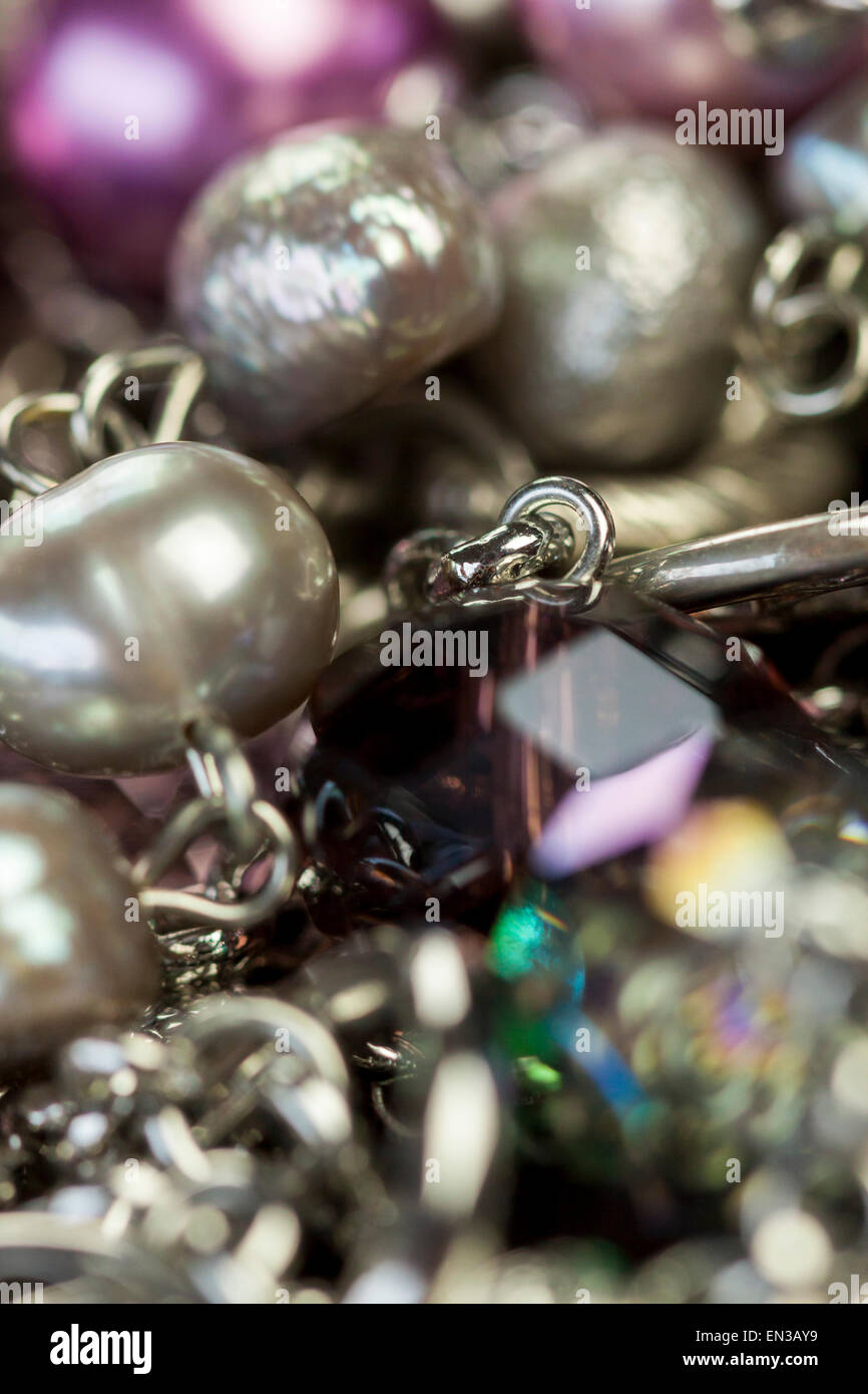 Gold beads attached hi-res stock photography and images - Alamy