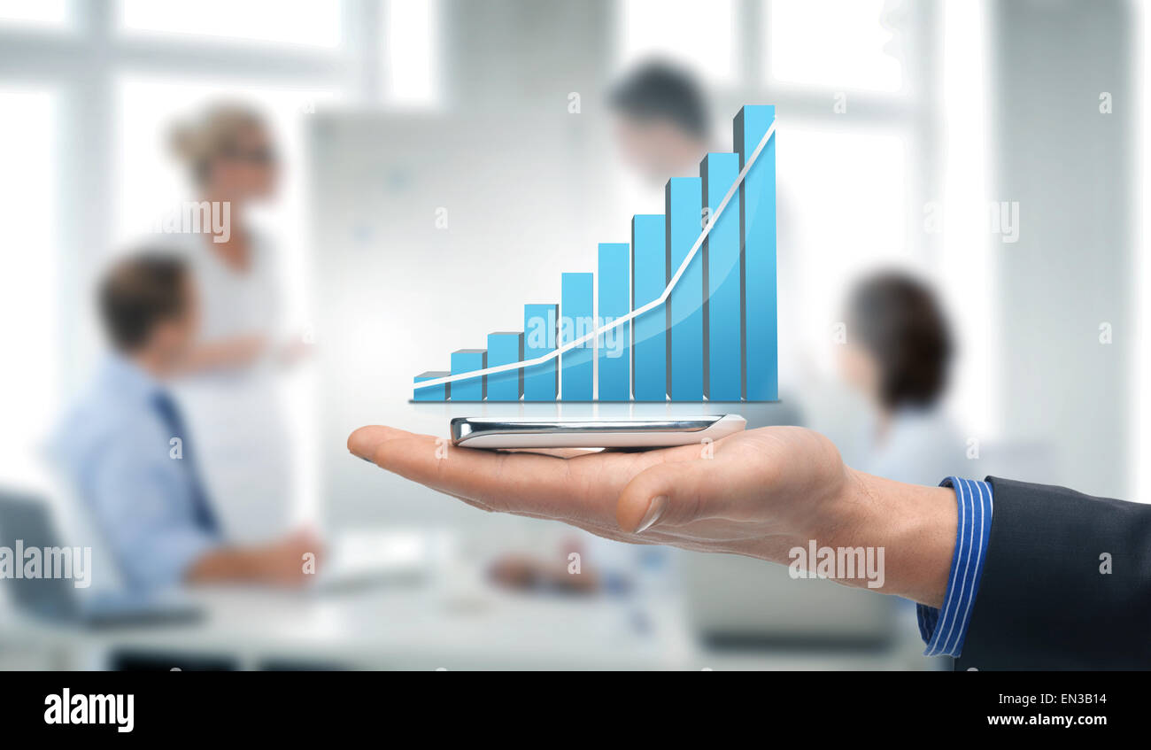 hand holding smartphone with virtual chart Stock Photo - Alamy