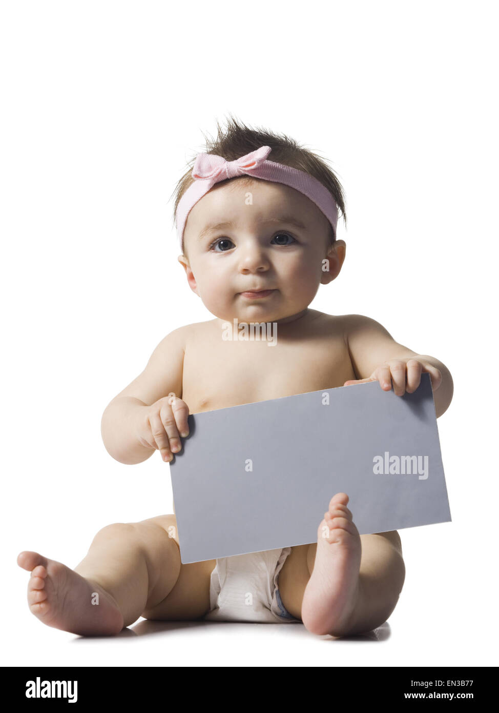 Baby girl with blank sign Stock Photo - Alamy