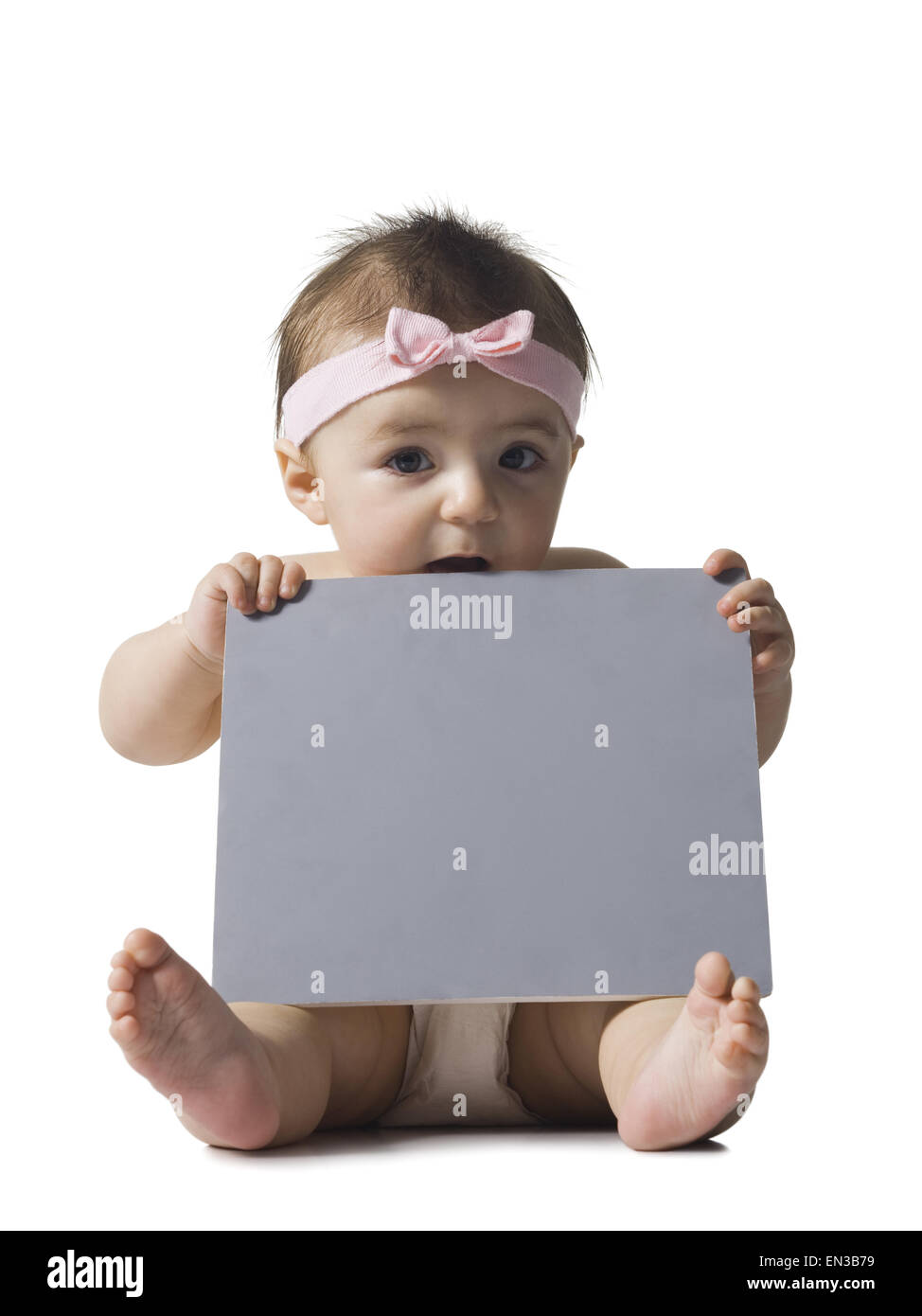 Baby girl with blank sign Stock Photo - Alamy