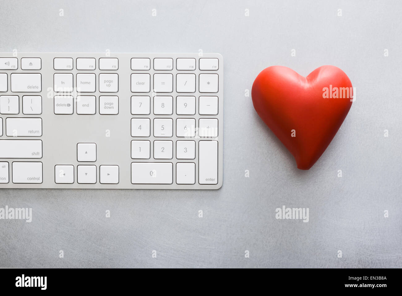 heart next to a keyboard Stock Photo - Alamy