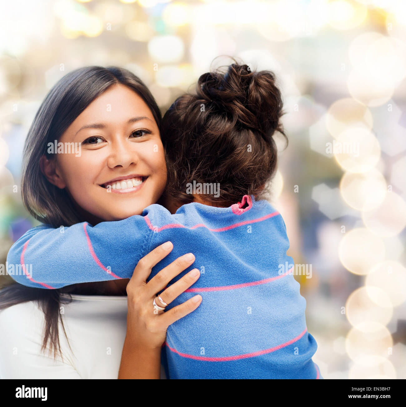 hugging mother and daughter Stock Photo - Alamy