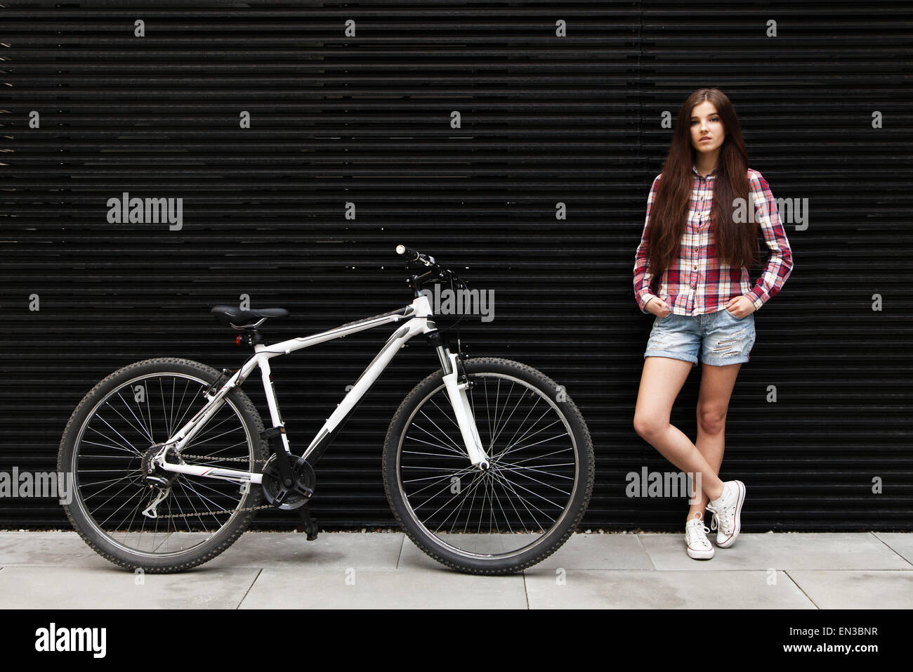 Black woman riding bicycle hi-res stock photography and images - Alamy