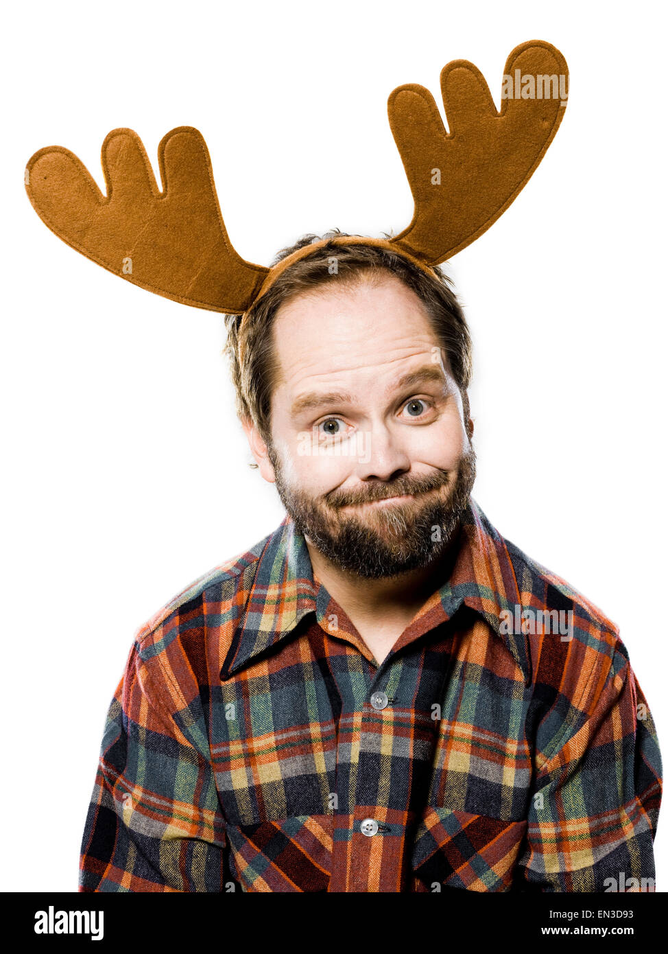 man in a plaid shirt wearing antlers Stock Photo - Alamy