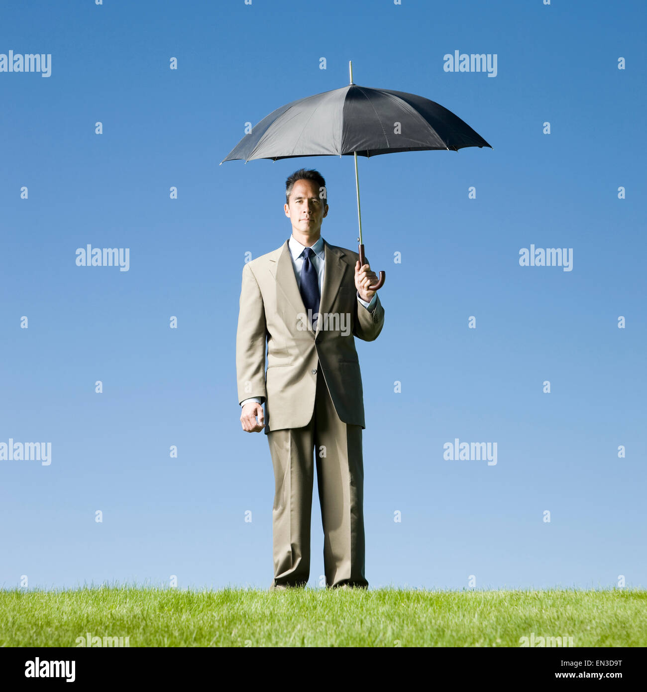 Black suit with umbrella hi-res stock photography and images - Alamy