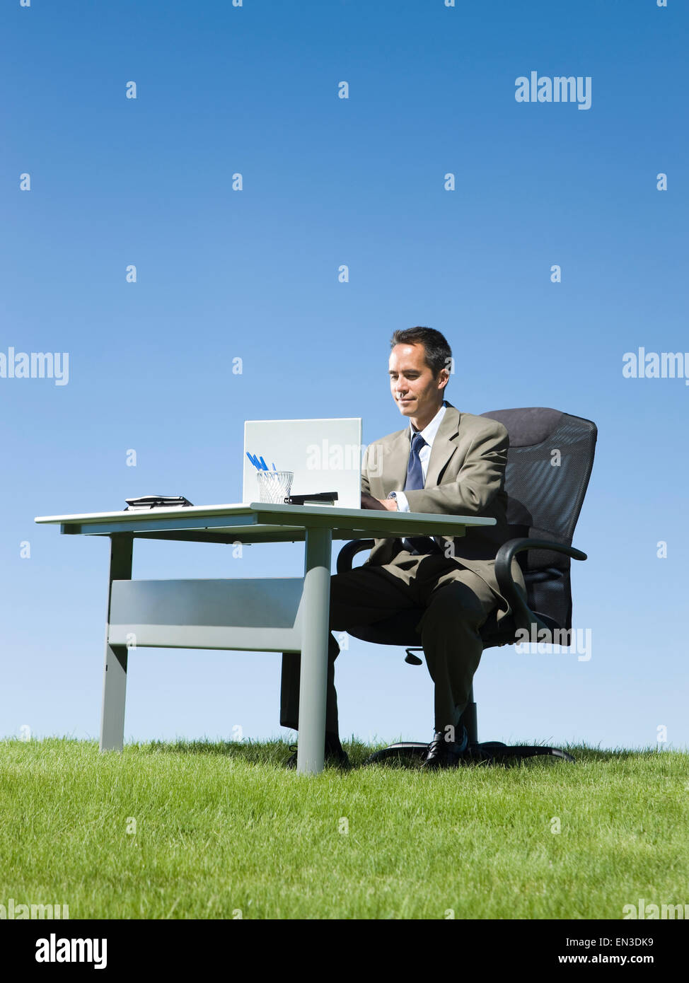 Office desk in grass field hi-res stock photography and images - Alamy