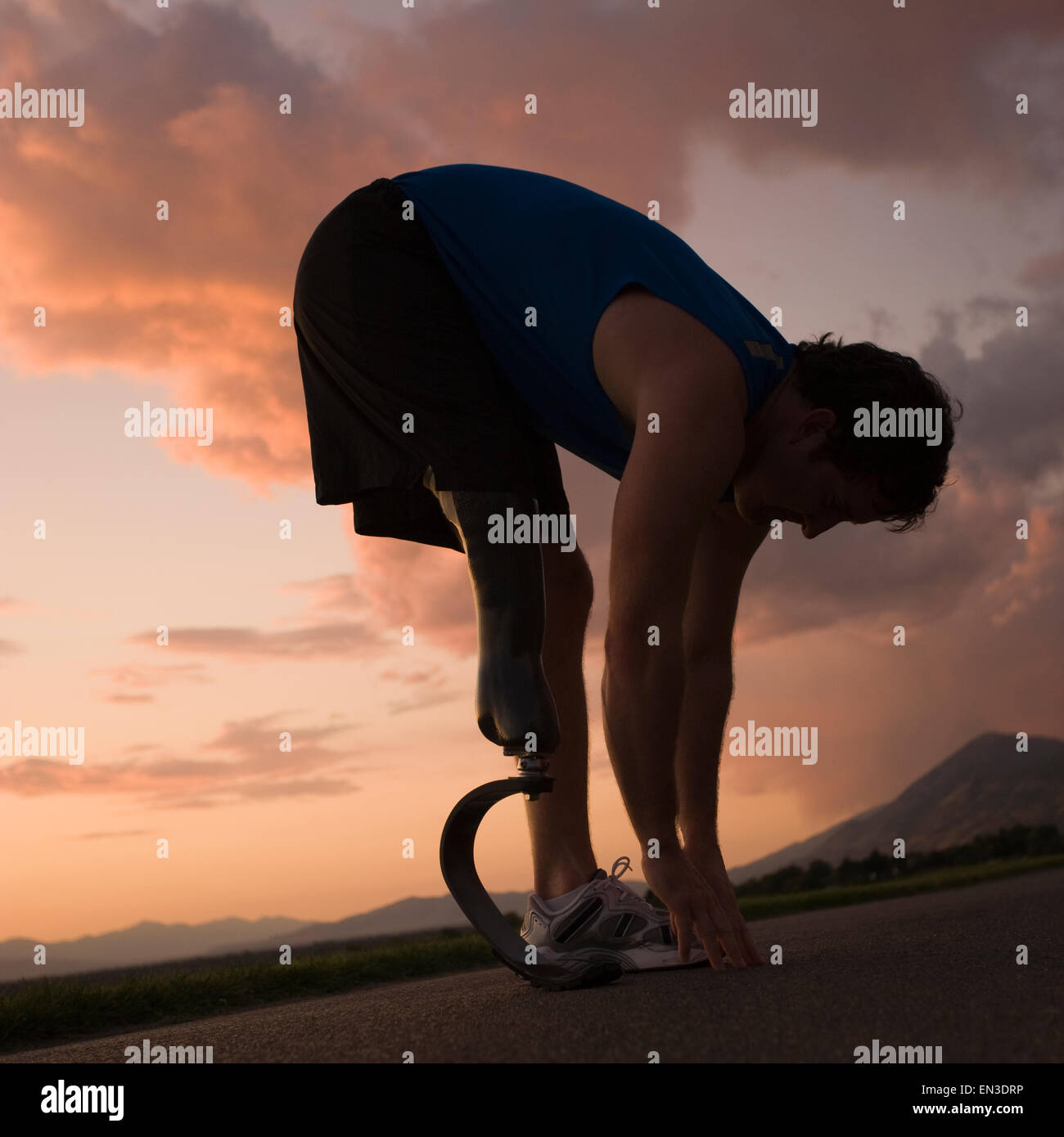 jogger with a right below knee prosthetic running leg Stock Photo - Alamy