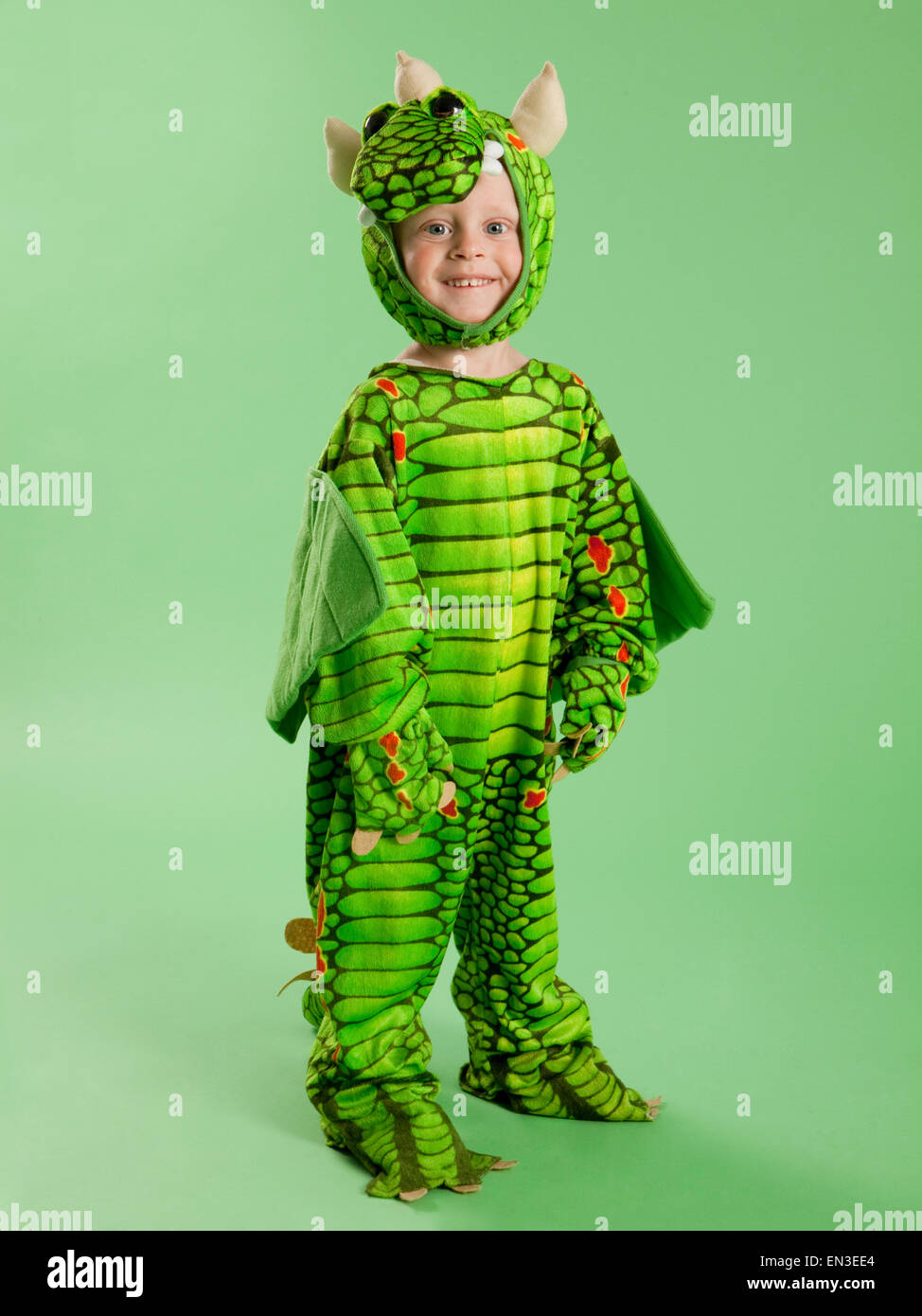 Portrait of boy (2-3) in dragon costume for Halloween Stock Photo - Alamy