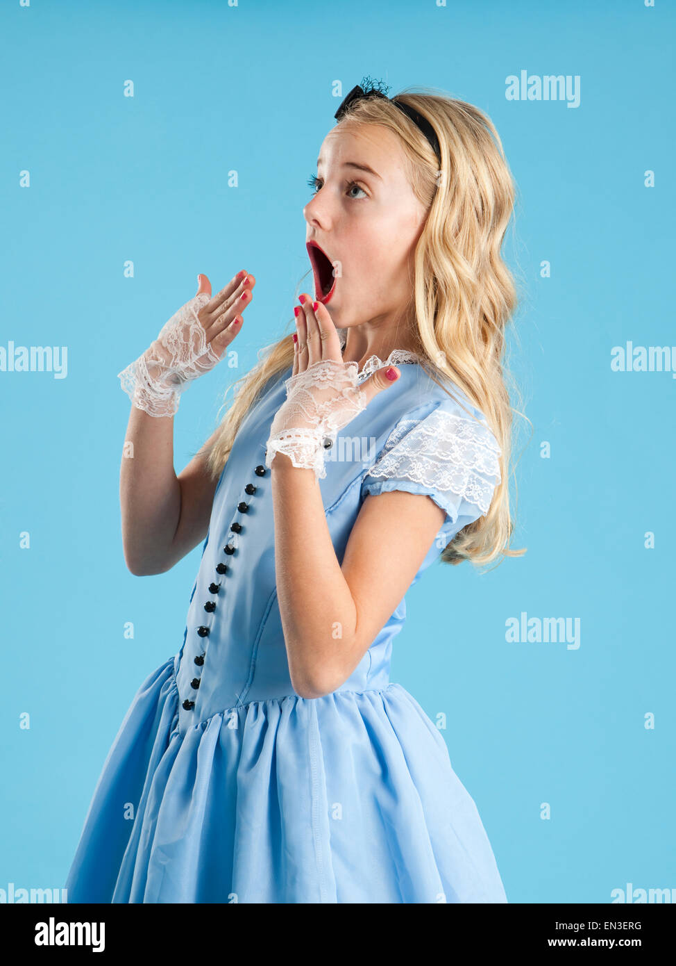 Alice in wonderland costume hi-res stock photography and images - Alamy