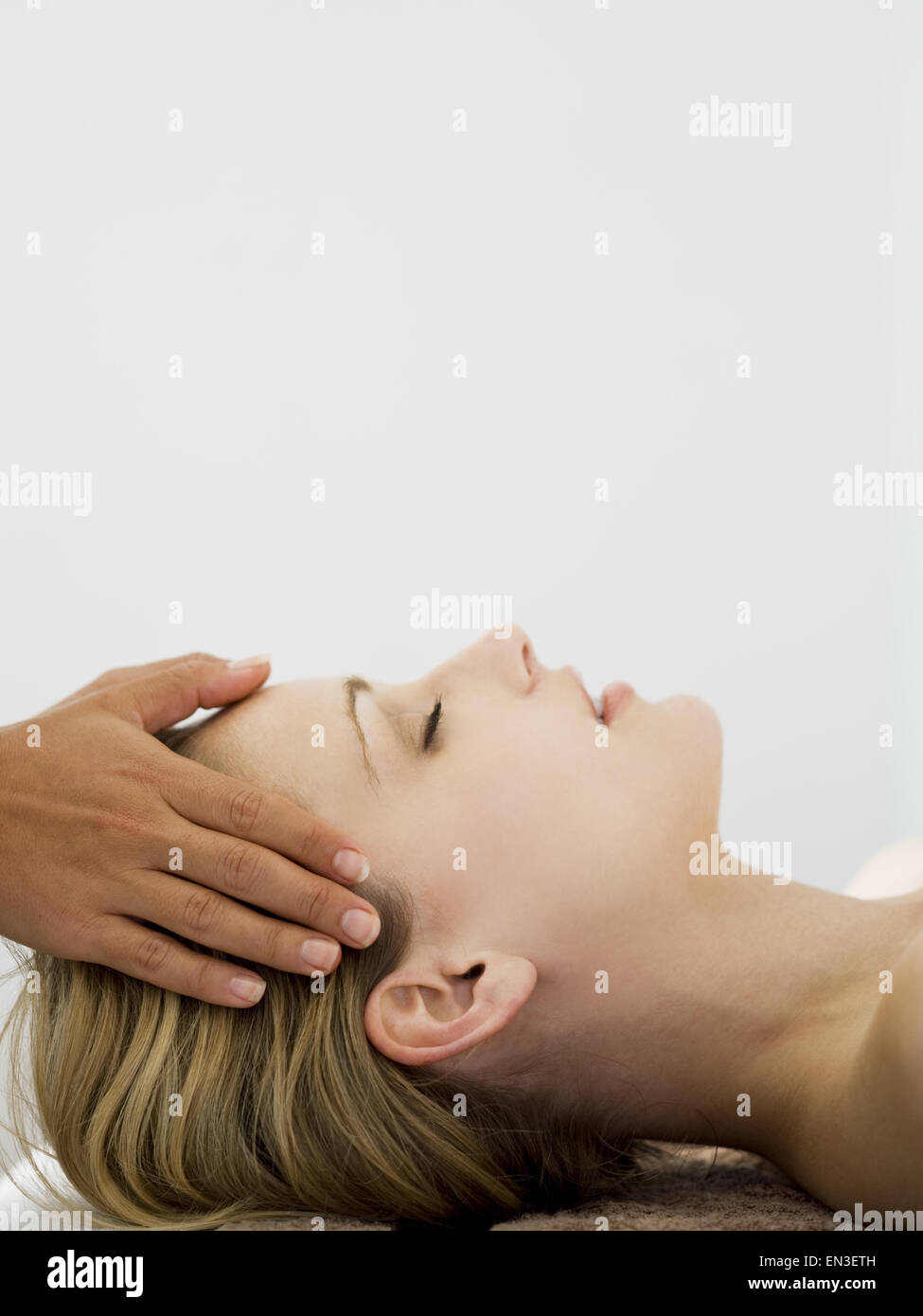 Woman getting head massage Stock Photo - Alamy