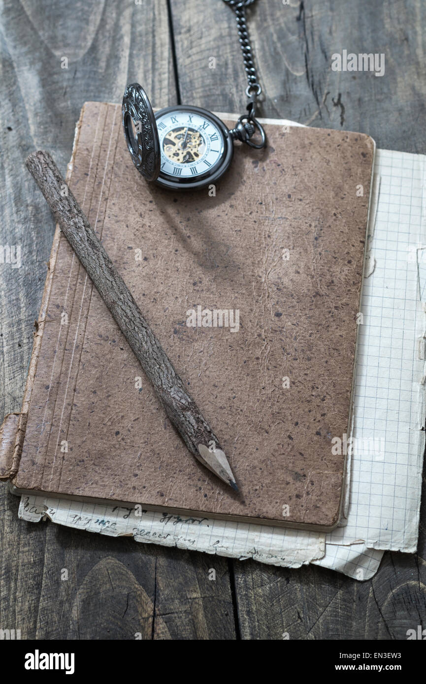 bark covered pencil on old paper, from above Stock Photo - Alamy