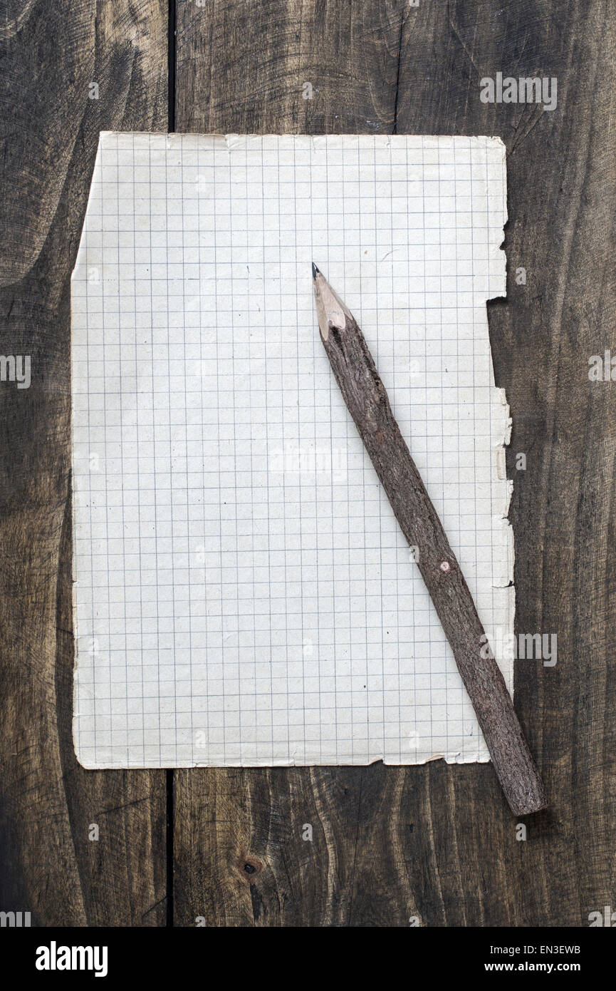 bark covered pencil on old paper, from above Stock Photo - Alamy