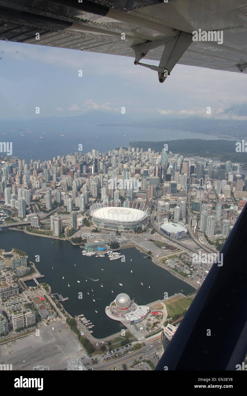 Seaplane flying over Vancouver Canada Stock Photo - Alamy