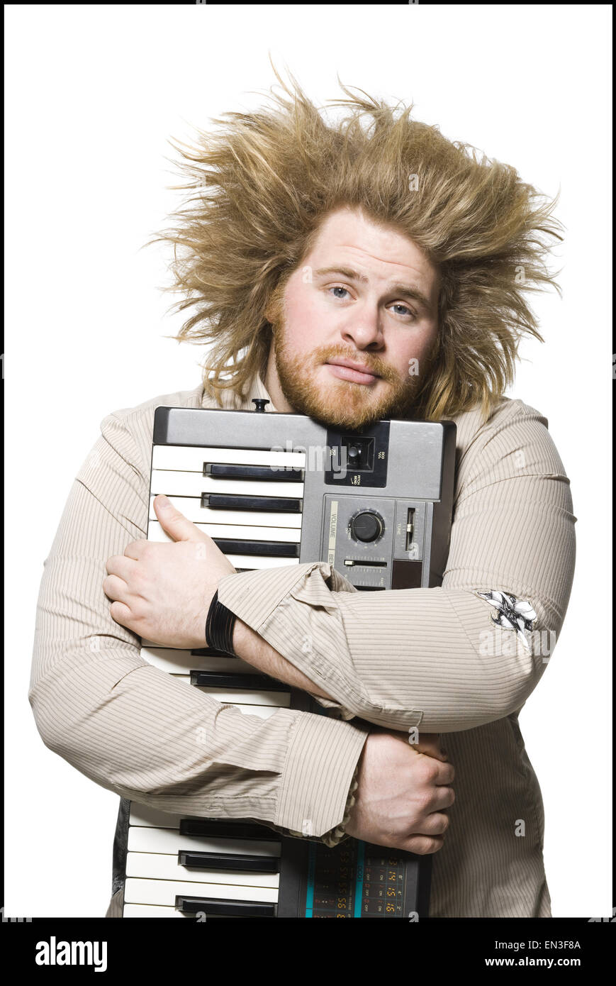 man holding a keyboard Stock Photo - Alamy
