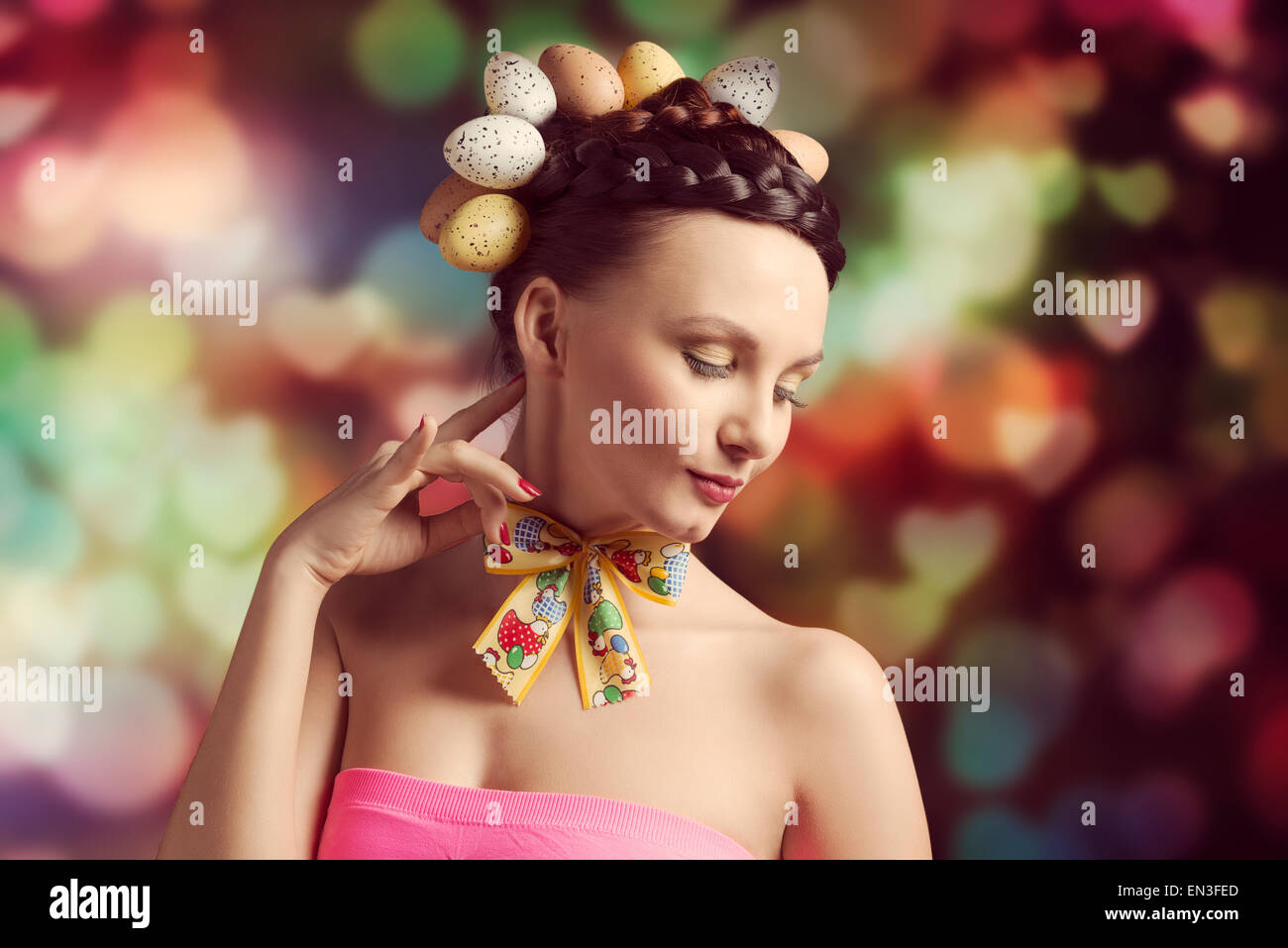 Brunette, colorful, spring, pretty woman with funny outfit and egg ...