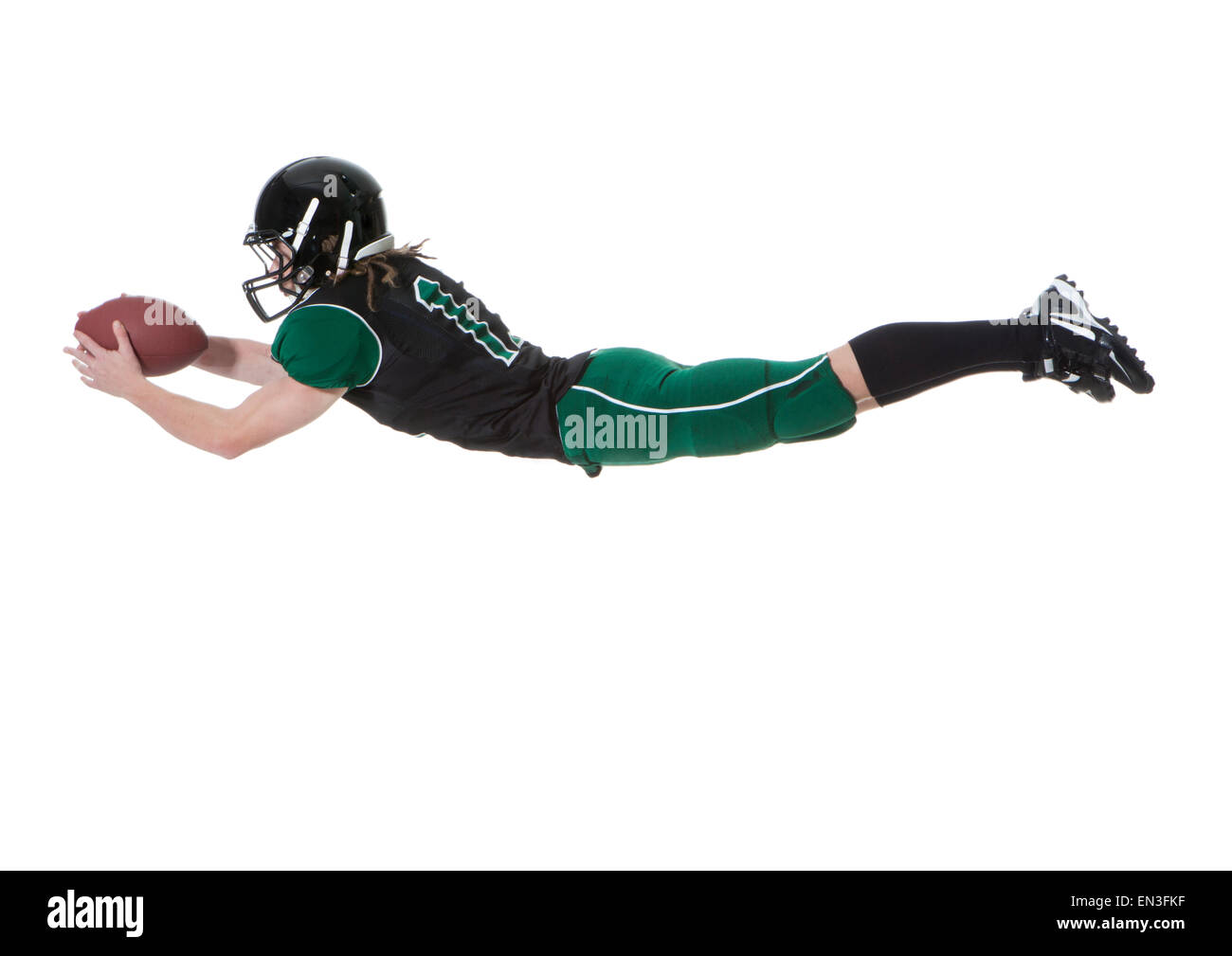 American football player catching ball hi-res stock photography and ...
