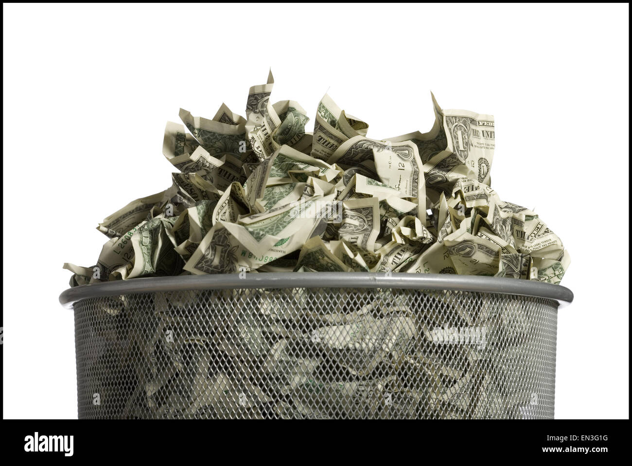 Waste paper basket with crumpled money Stock Photo - Alamy