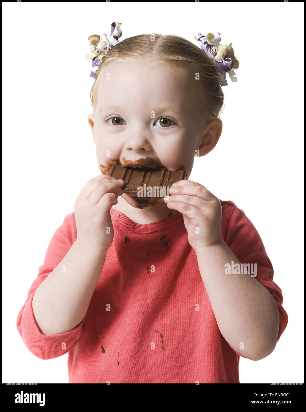 Girl messy eating junk food hi-res stock photography and images - Alamy