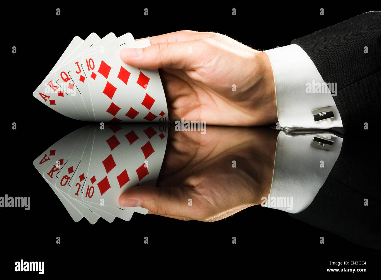 hand holding playing cards Stock Photo - Alamy