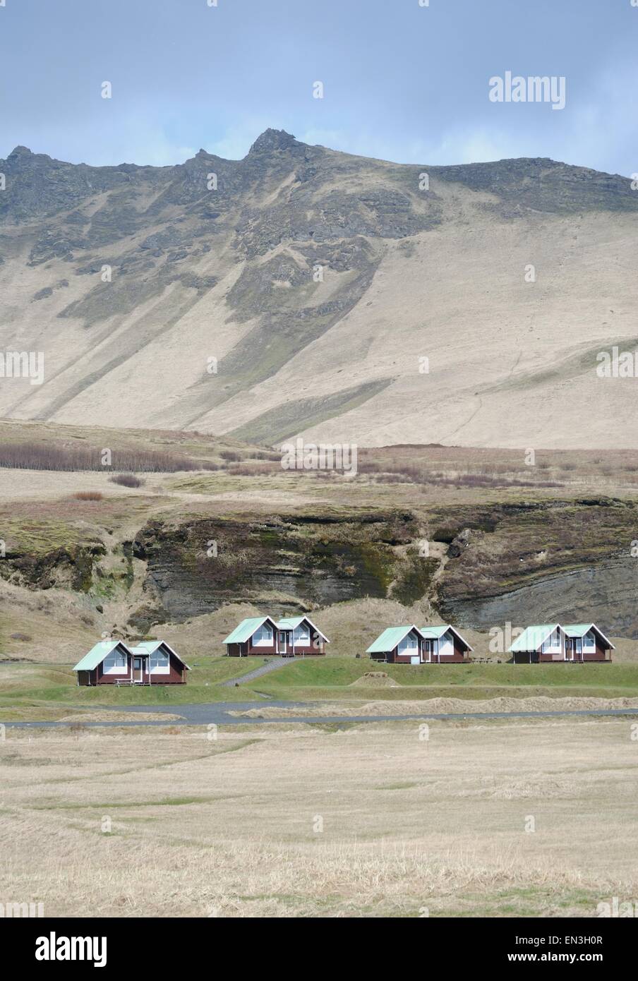 Remote chalet houses in a dramatic landscape, Iceland Stock Photo - Alamy