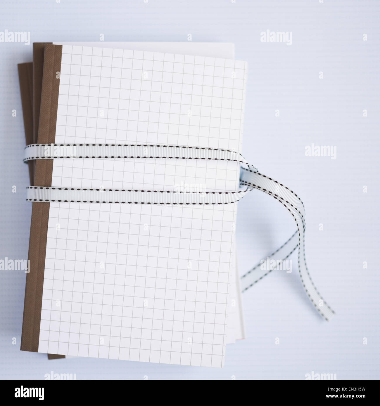Two hardcover notebooks with ribbon Stock Photo - Alamy