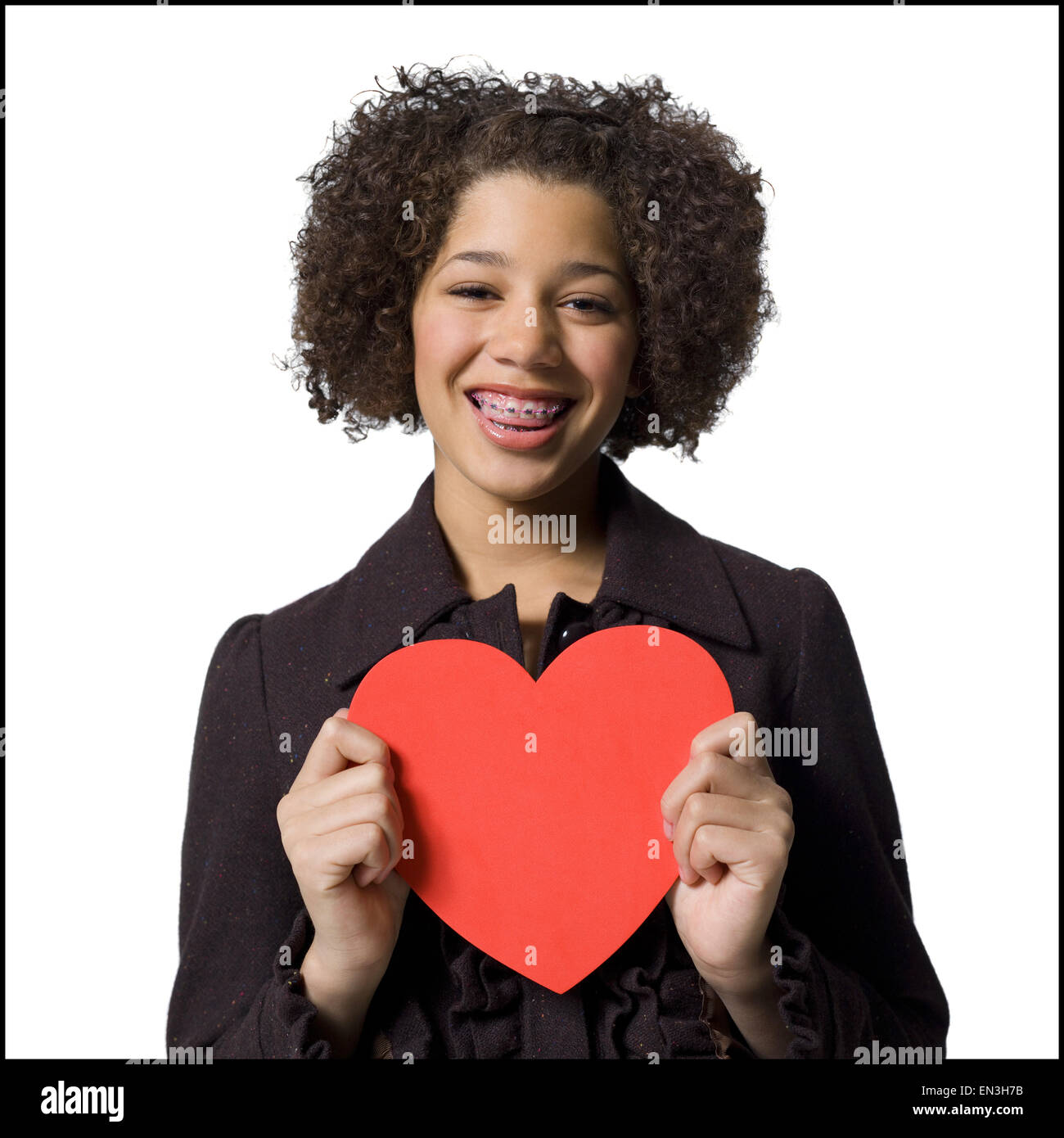 Girl with red heart Stock Photo - Alamy