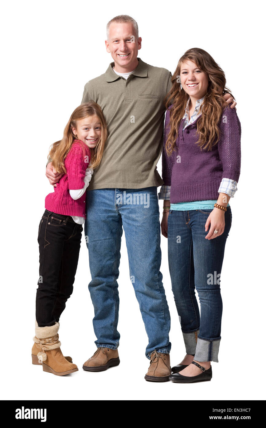 Studio shot of father with two daughters standing Stock Photo - Alamy