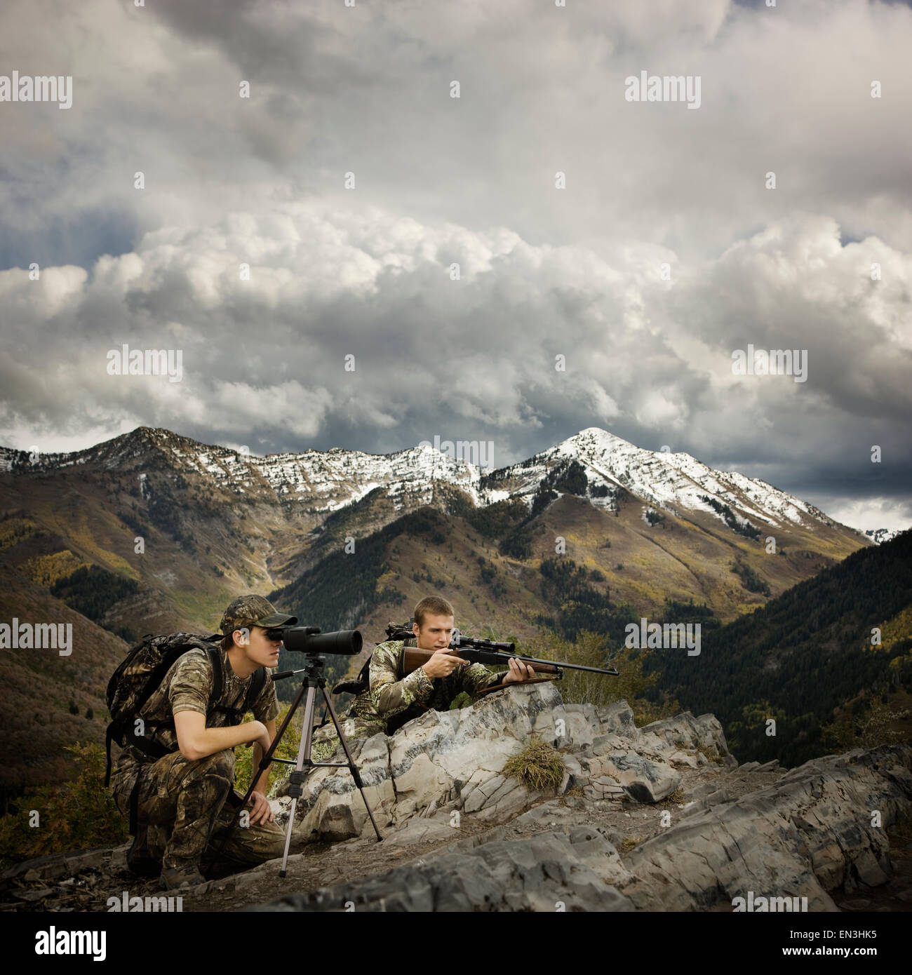 hunter using binoculars to spot prey Stock Photo - Alamy