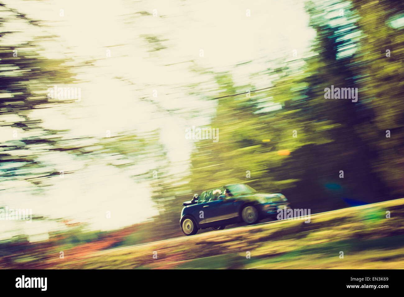 New Mini Convertible - Driving on Road Stock Photo - Alamy