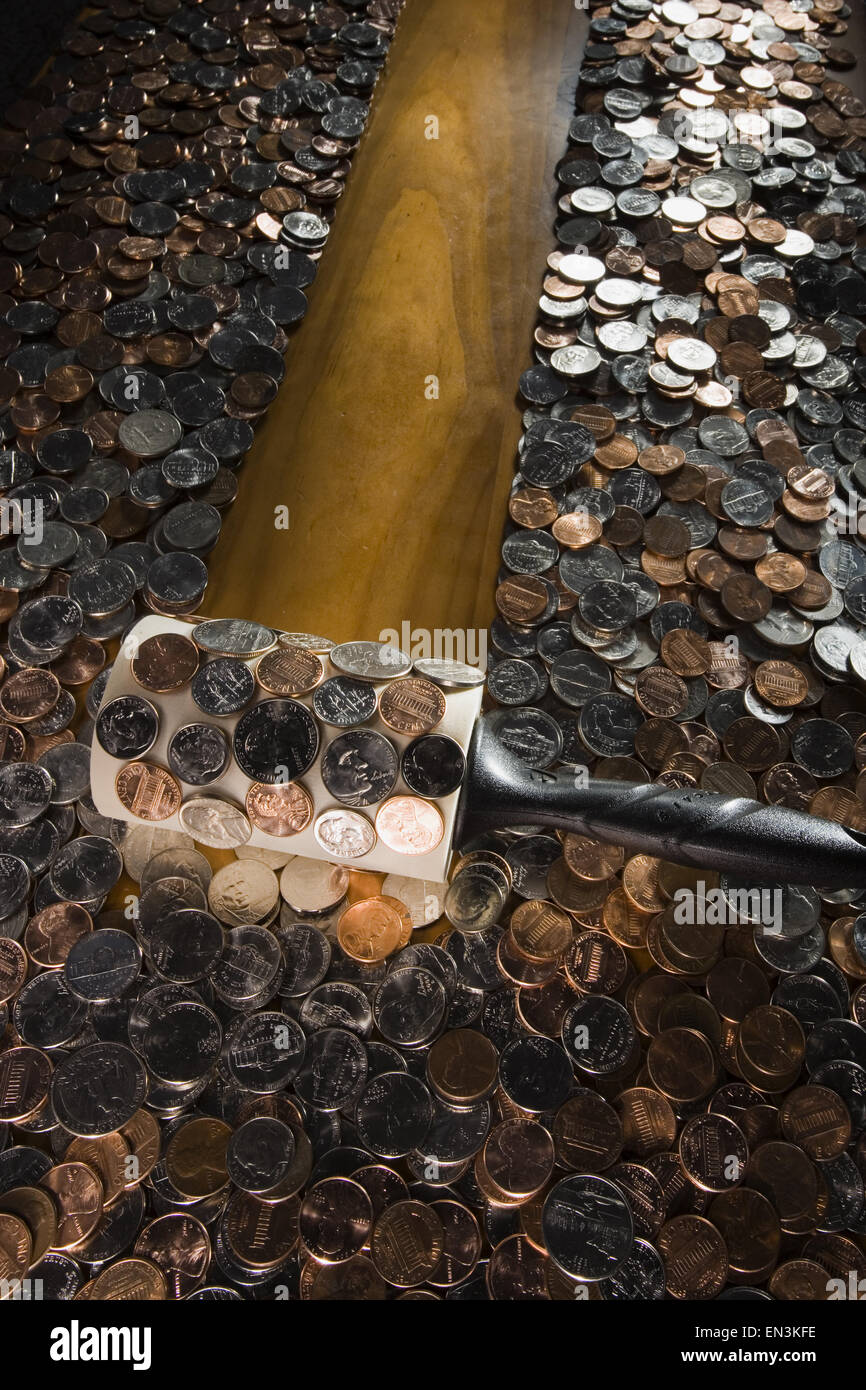 Lint roller picking up loose change Stock Photo - Alamy