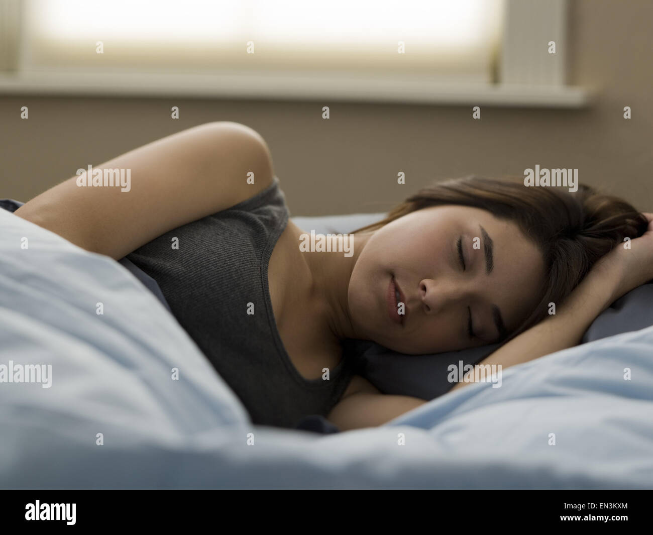 Woman asleep bed alone hi-res stock photography and images - Alamy