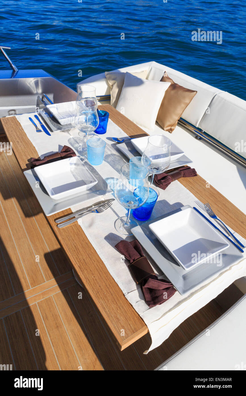lunch on motor yacht, Table setting at a luxury yacht Stock Photo - Alamy