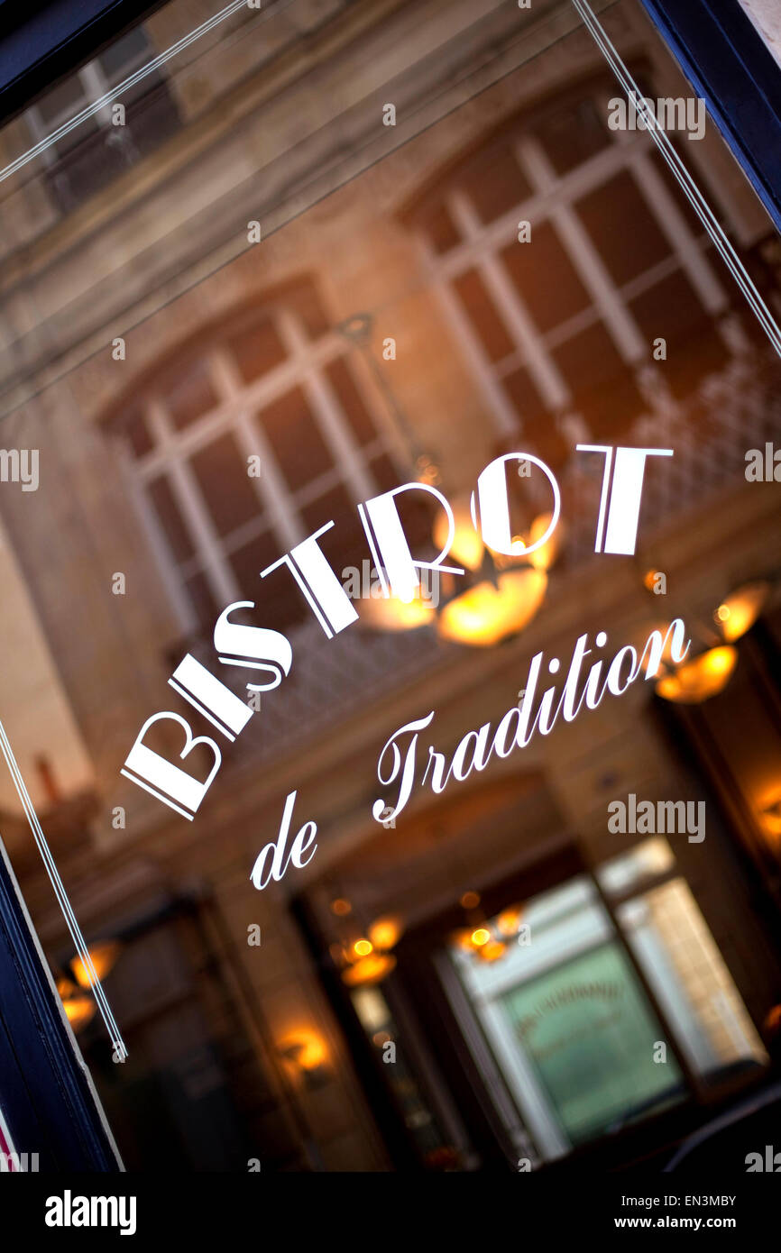 Window of an old French bistro in the city Stock Photo - Alamy