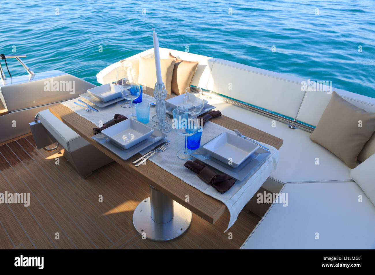 lunch on motor yacht, Table setting at a luxury yacht Stock Photo - Alamy