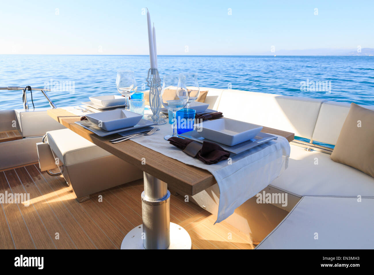 lunch on motor yacht, Table setting at a luxury yacht Stock Photo - Alamy