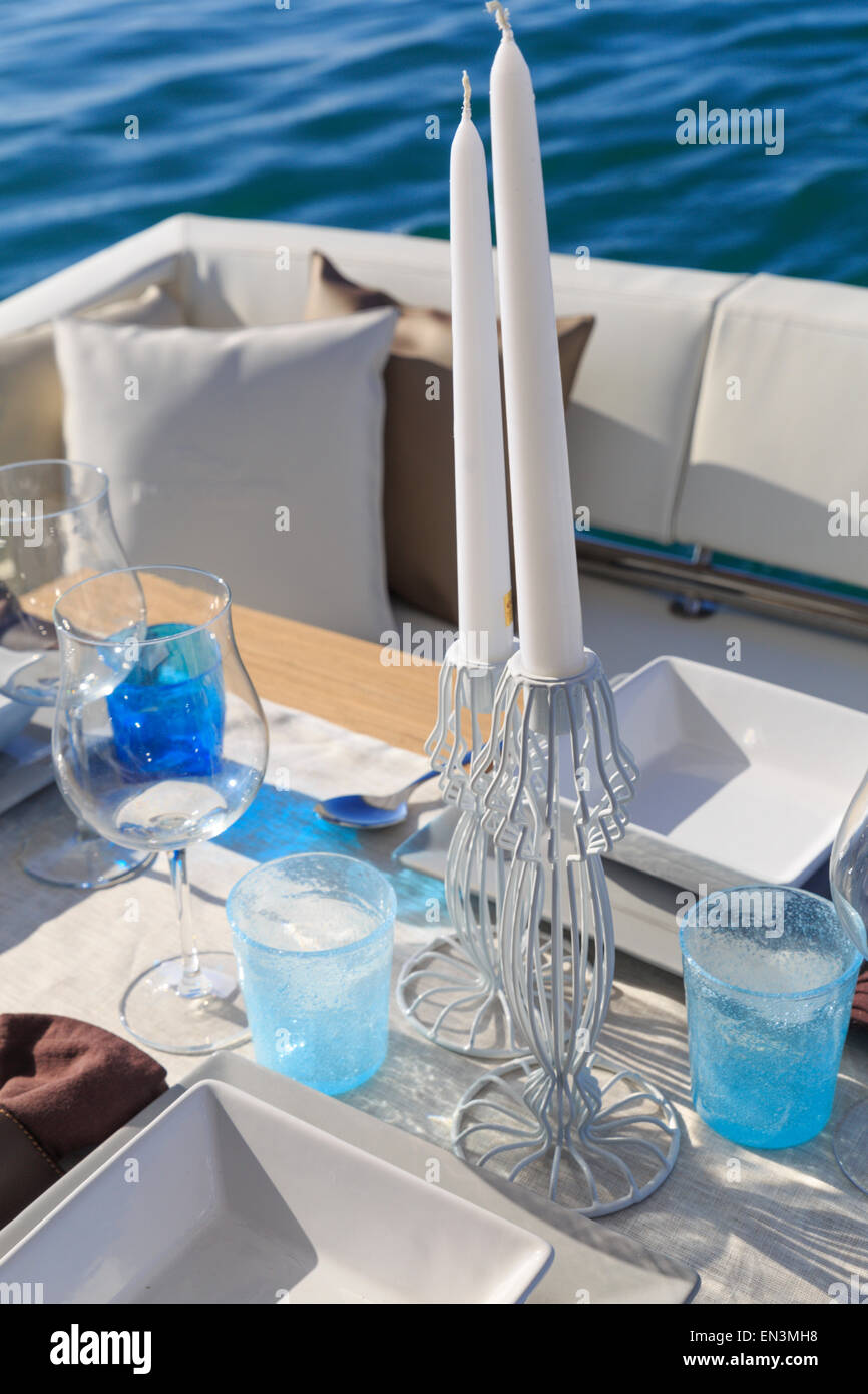 lunch on motor yacht, Table setting at a luxury yacht Stock Photo - Alamy