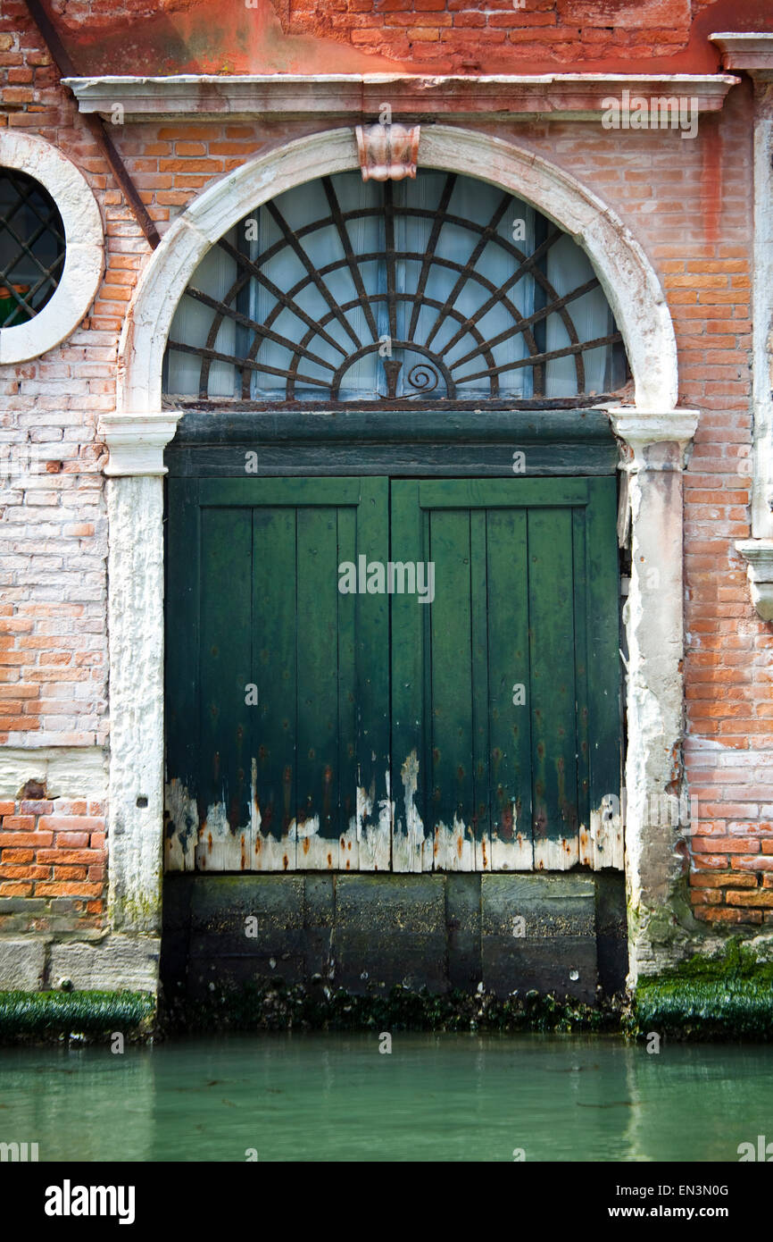 Italy, Venice, Door by canal Stock Photo - Alamy