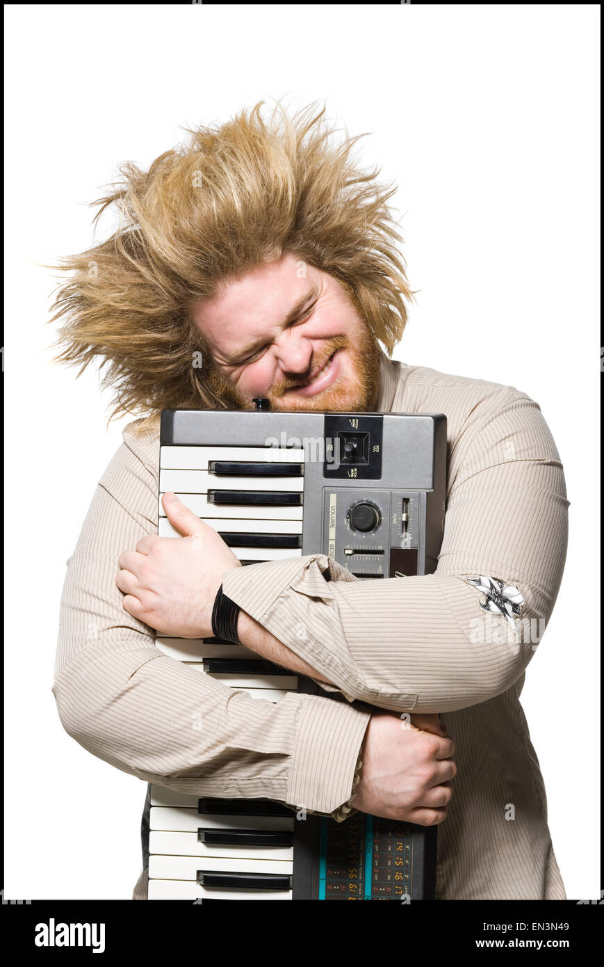 man holding a keyboard Stock Photo - Alamy