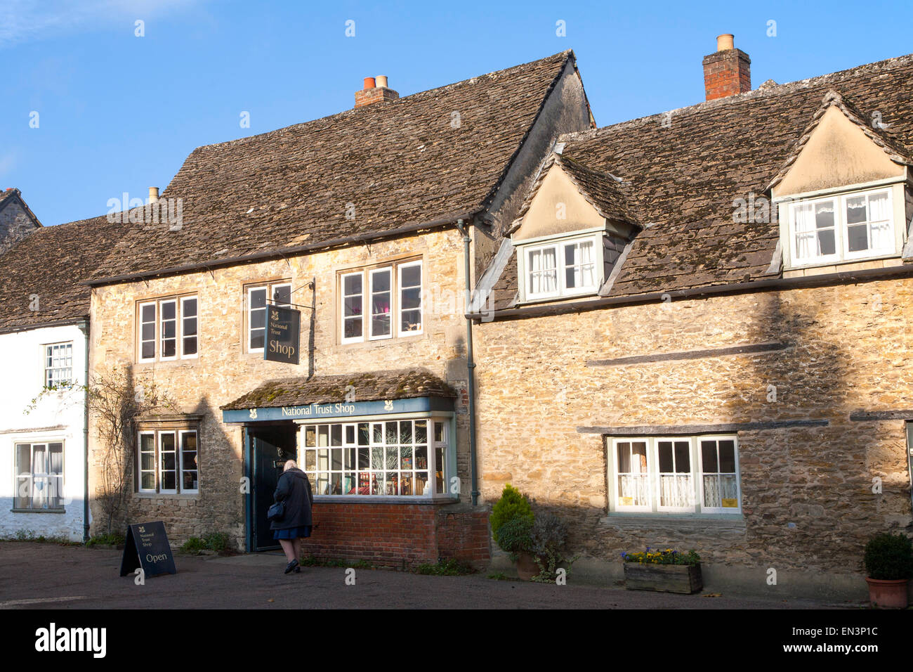 Traditional old fashioned exterior of national trust shop at lacock hi ...