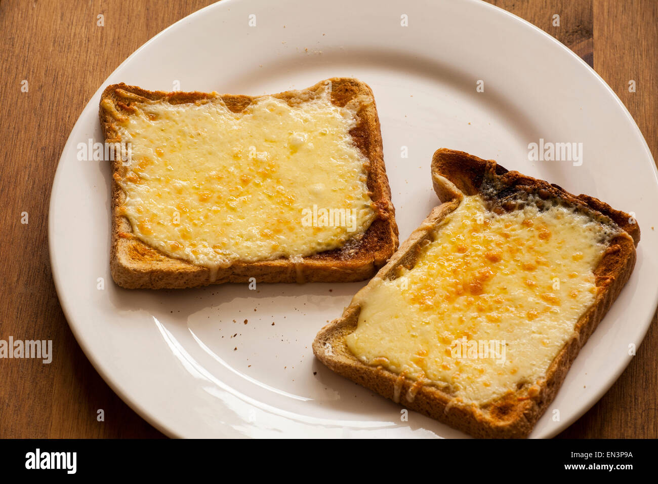 Plate of cheese on toast Stock Photo - Alamy