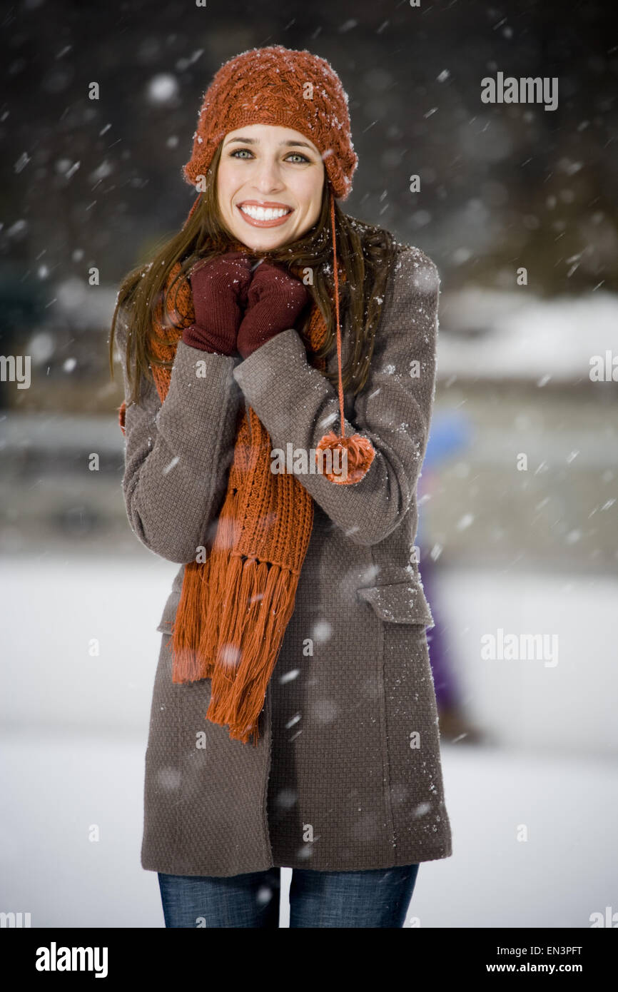 Woman outdoors in winter smiling Stock Photo - Alamy