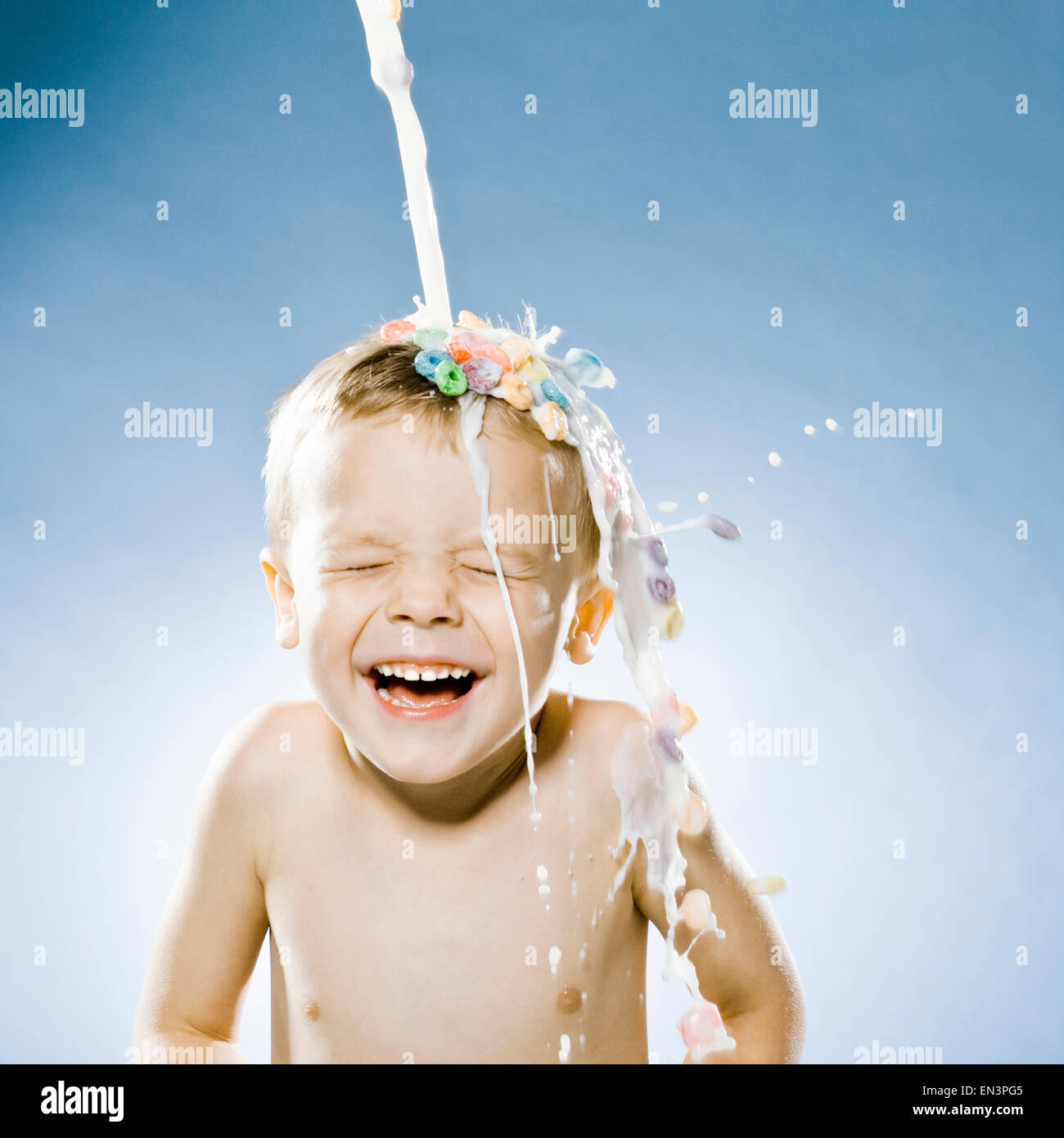 boy with cereal and milk being poured on his head Stock Photo - Alamy