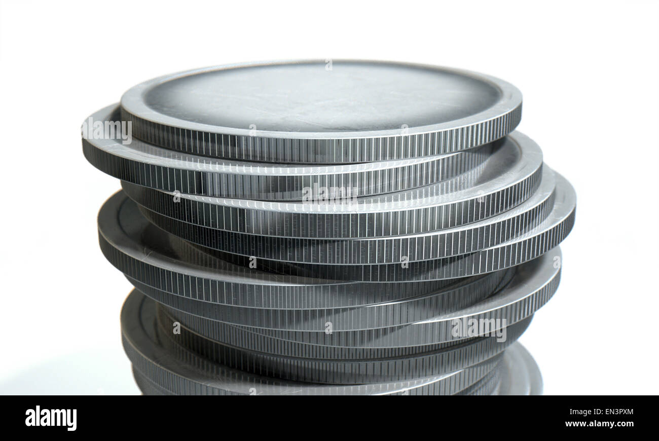 An extreme closeup of a stack of blank silver coins on an isolated ...