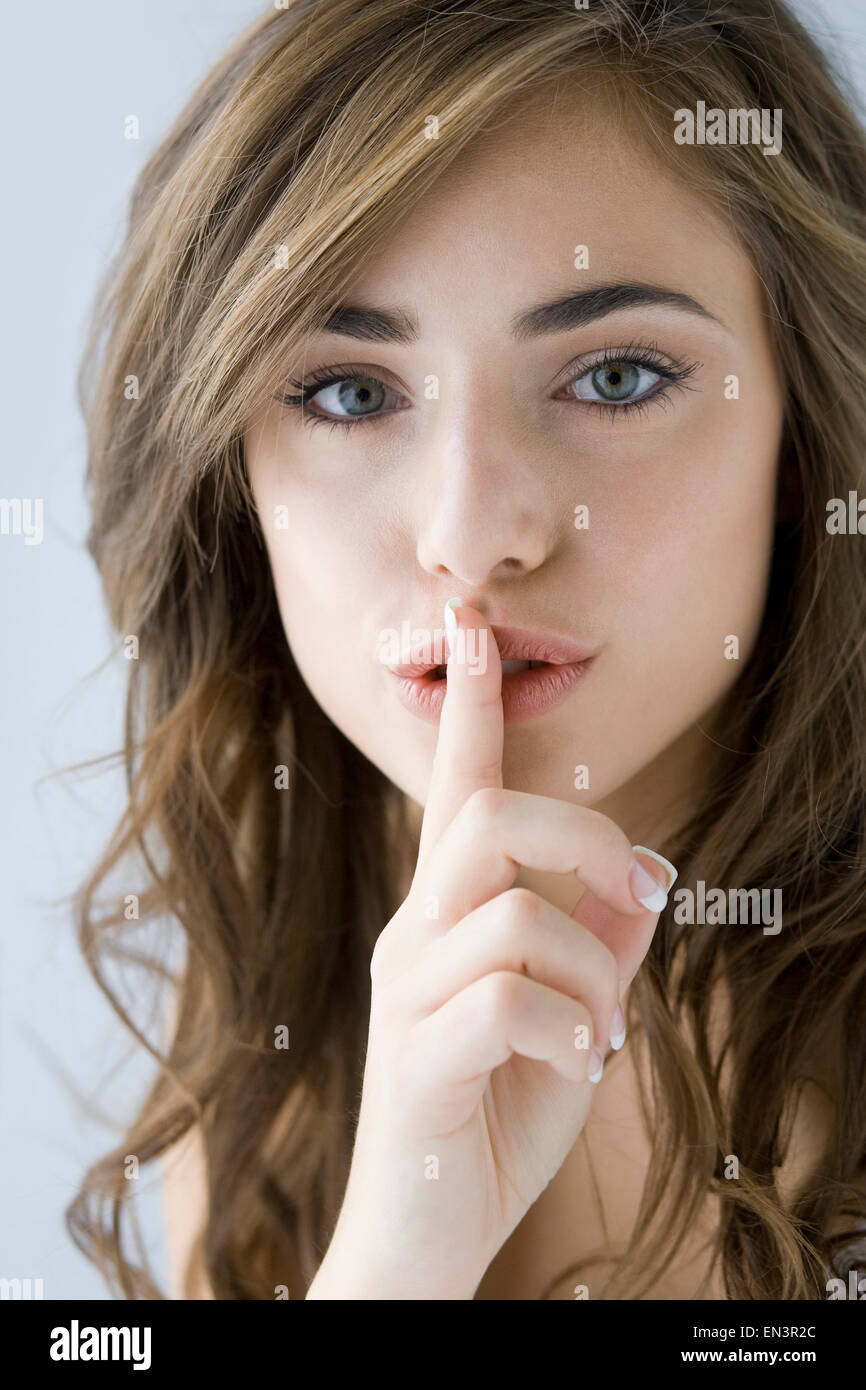 woman looking at camera Stock Photo - Alamy
