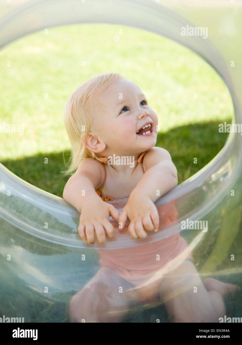 little girl in an inner tube Stock Photo - Alamy