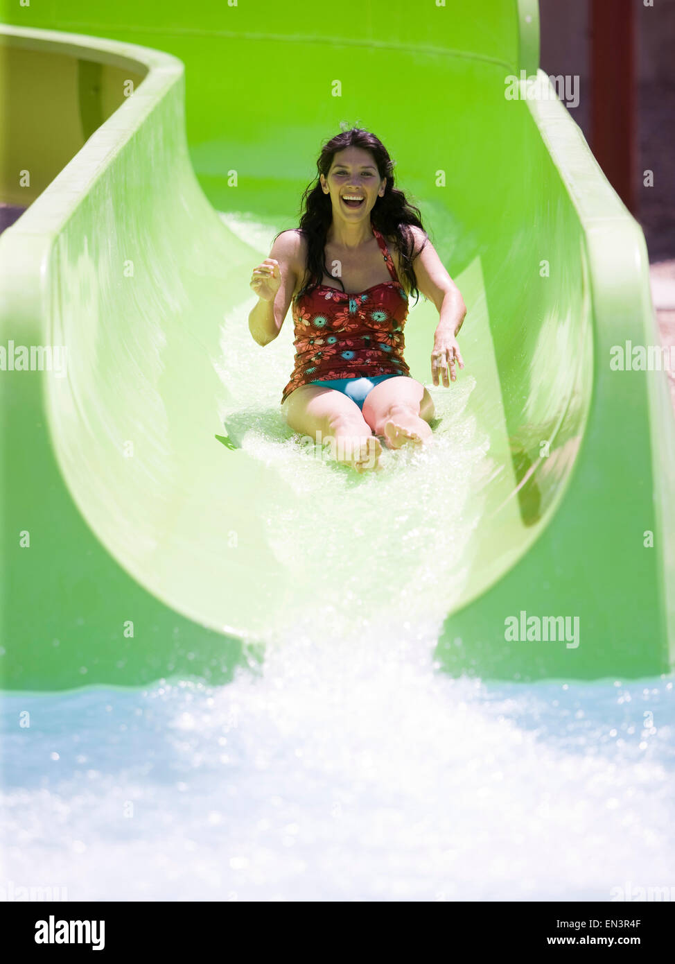 woman on a waterslide Stock Photo - Alamy