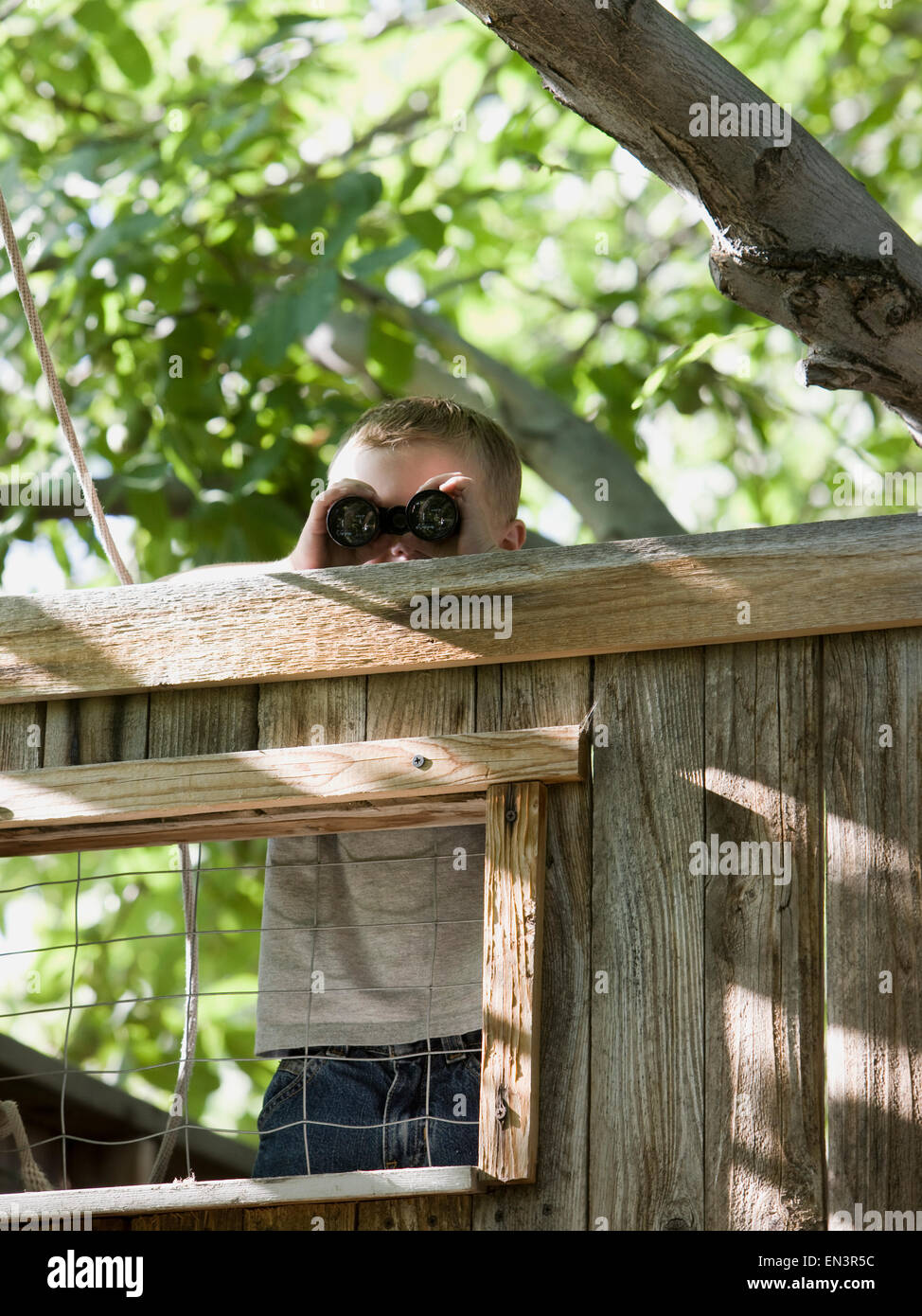 little boy looking through binoculars Stock Photo - Alamy