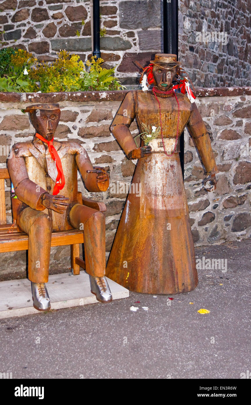 Street art, male and female tinplate metal android robots, St. Cuthbert ...